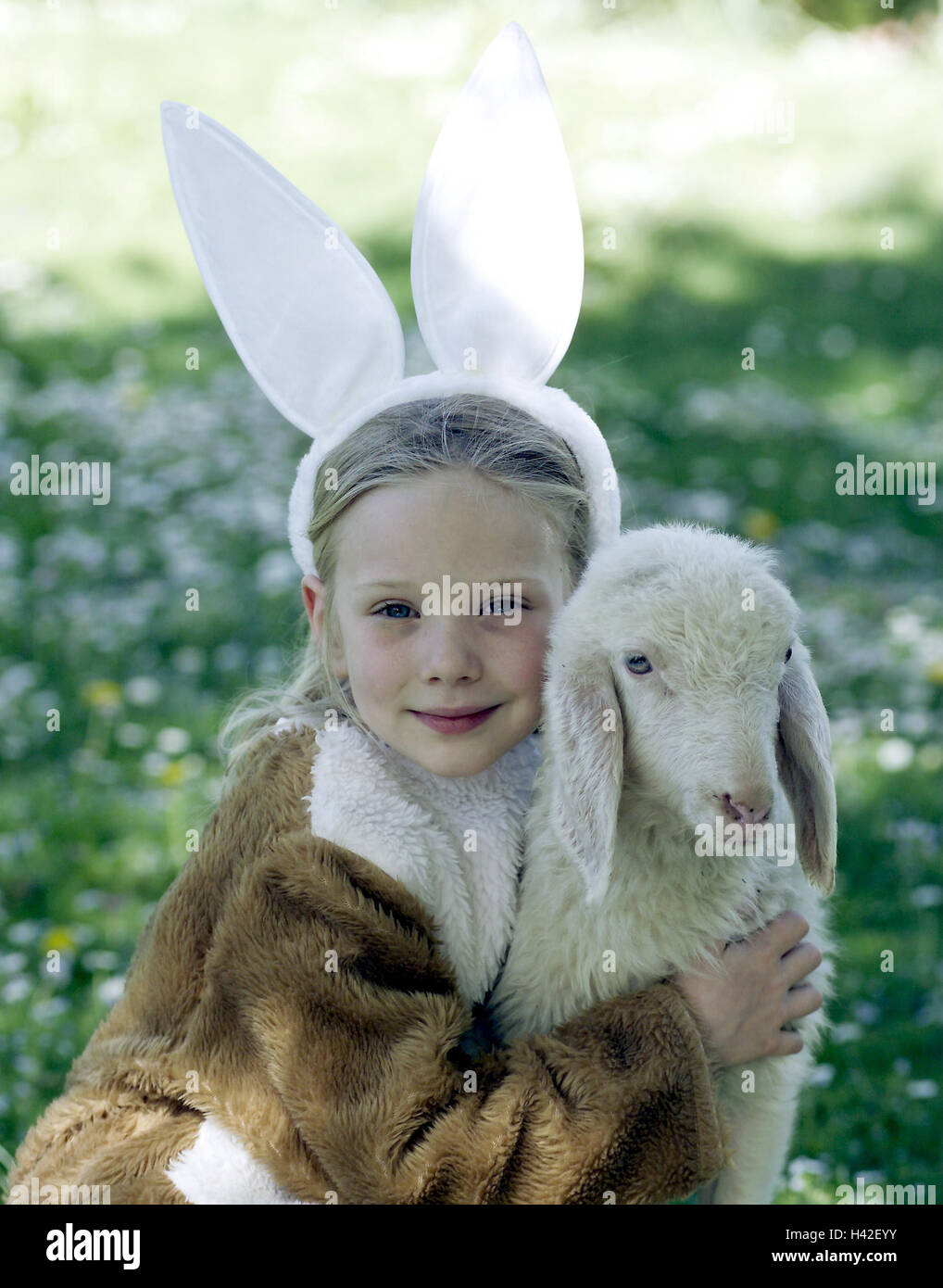 Meadow, girl, hare's costume, lamb, embrace, portrait, Easter, Easter ...