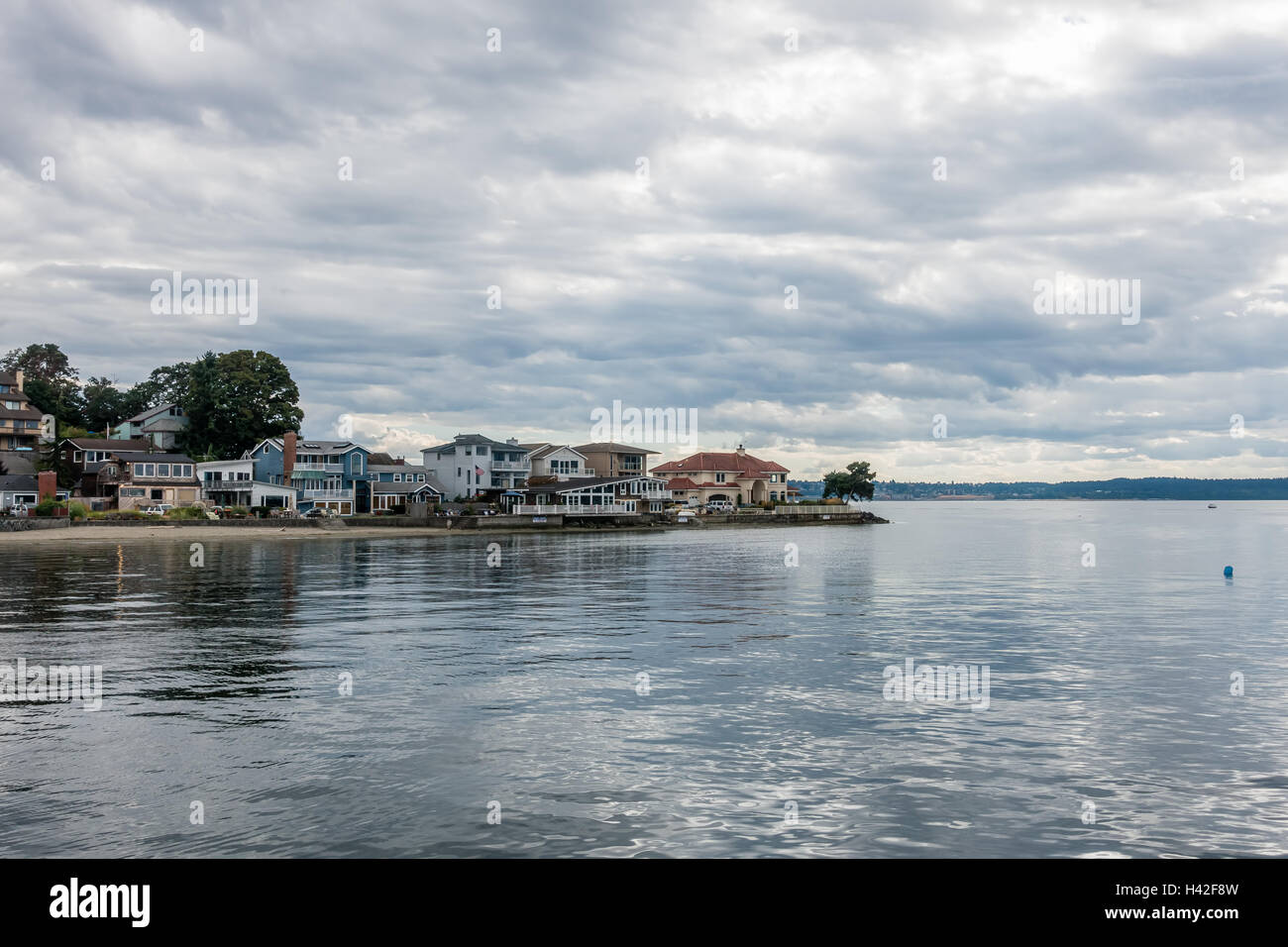 A veie of residences along the shoreline at Dash Point, Washington ...