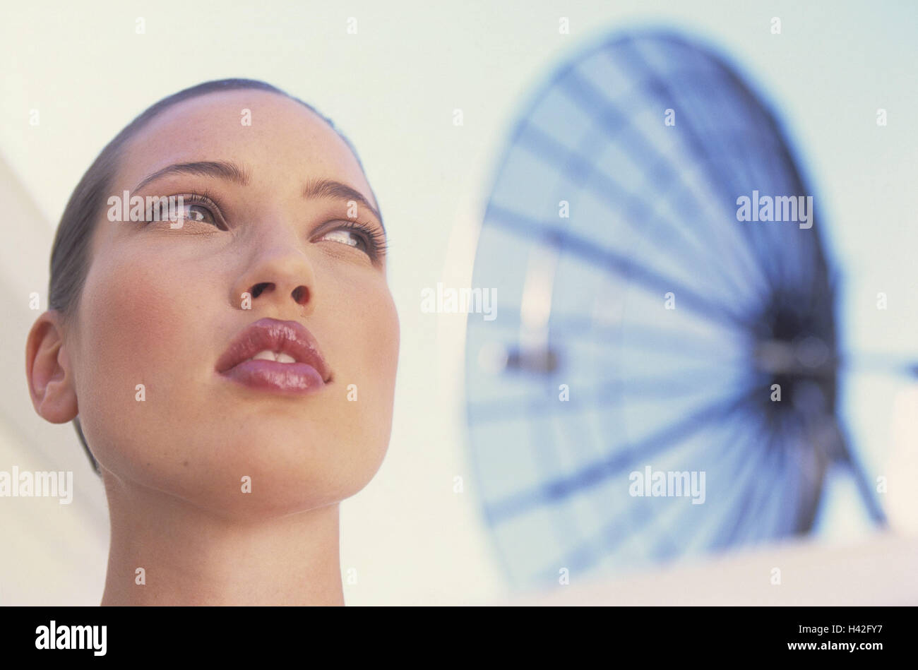 Woman, young, view side view, portrait, background, satellite aerial ...