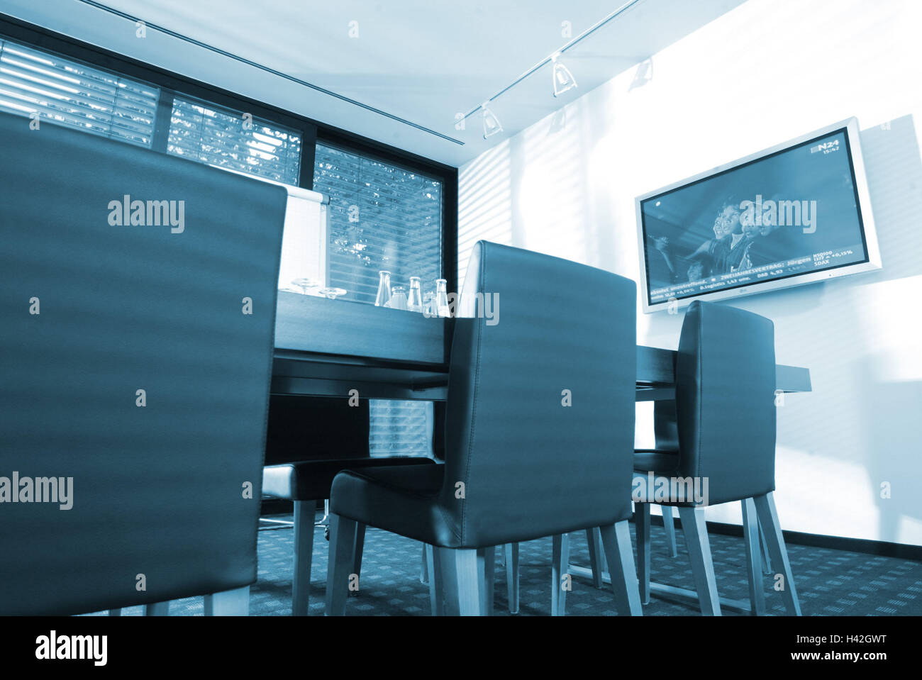 Meeting room, conference table, flat screen TV, window front, Venetian ...