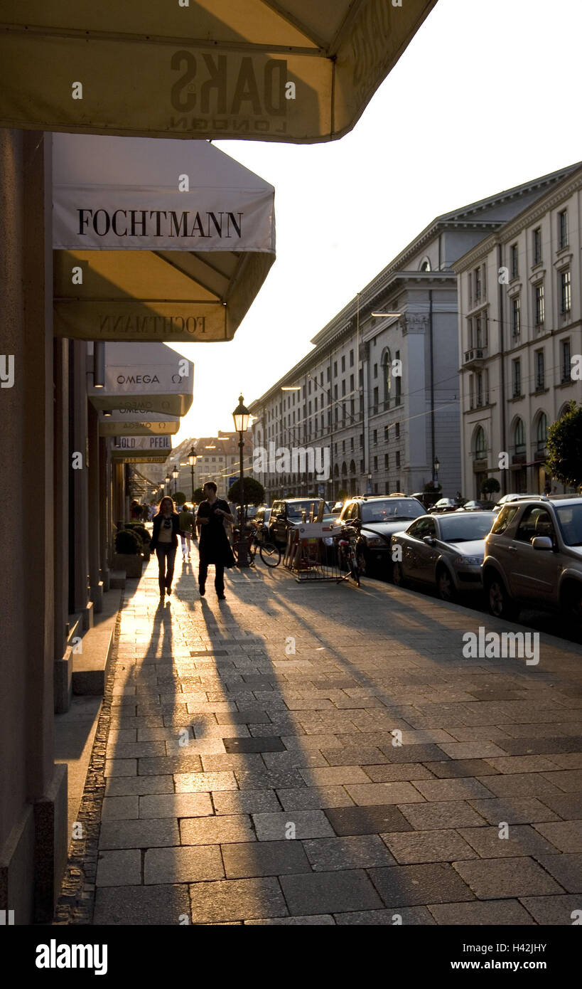 Street scene, pedestrian, shade, evening light Stock Photo - Alamy
