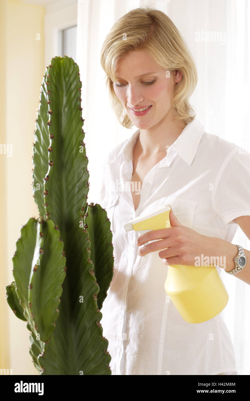 Woman, young, indoor plant, spurge, moisten, spray Bottle, smile, half ...