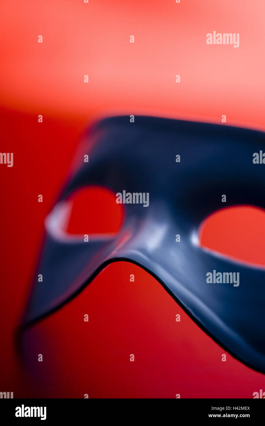 Mask, blue, background red, blur, close up Stock Photo - Alamy