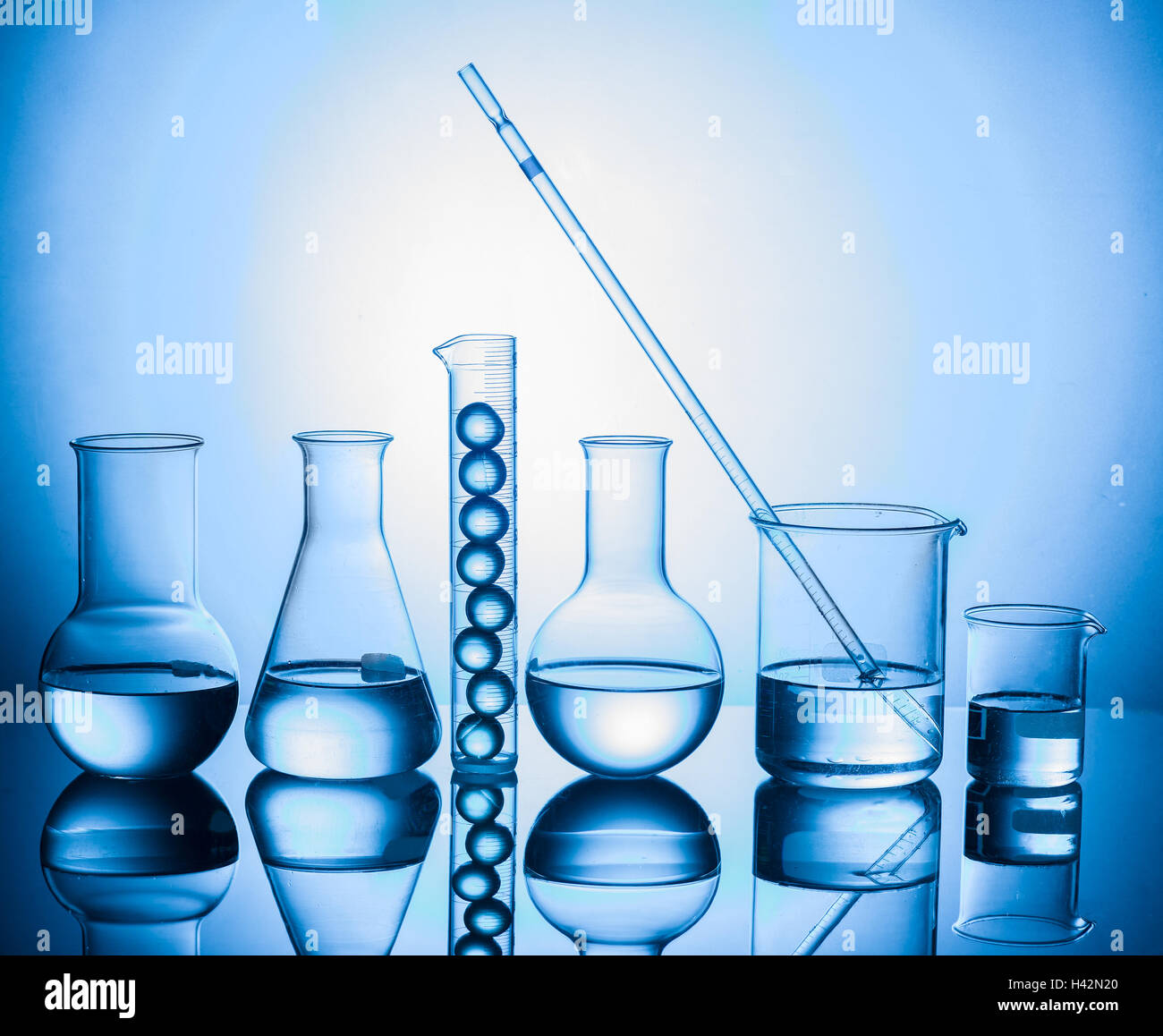 Still life with scientific glassware Stock Photo - Alamy