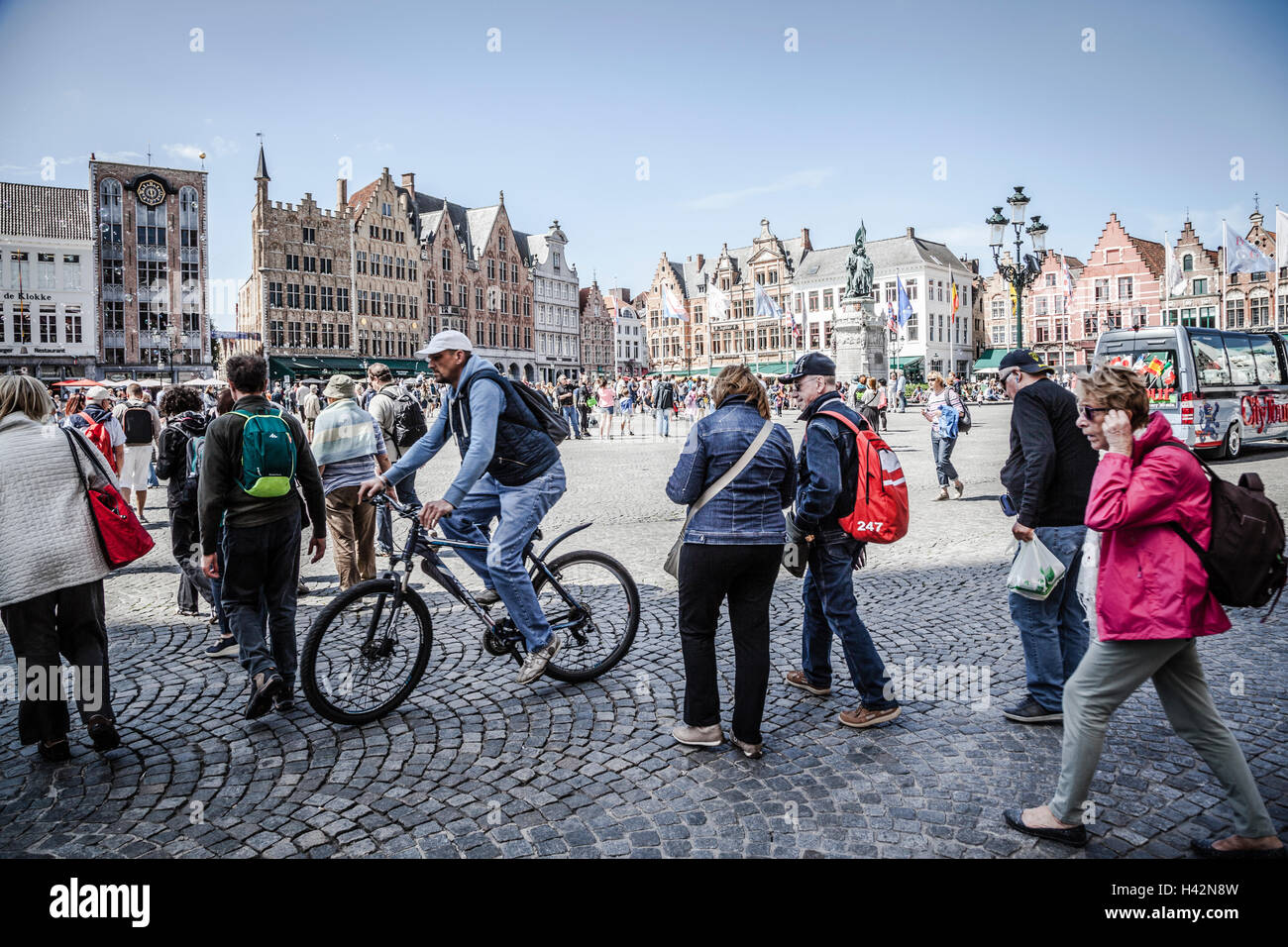 People are gathering on the main square in belgian bruges Stock Photo ...