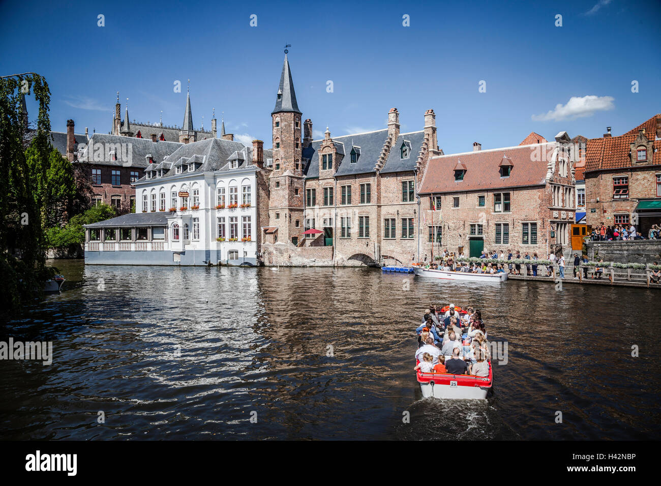 Scenic city view of Bruges canal with beautiful medieval colored houses ...