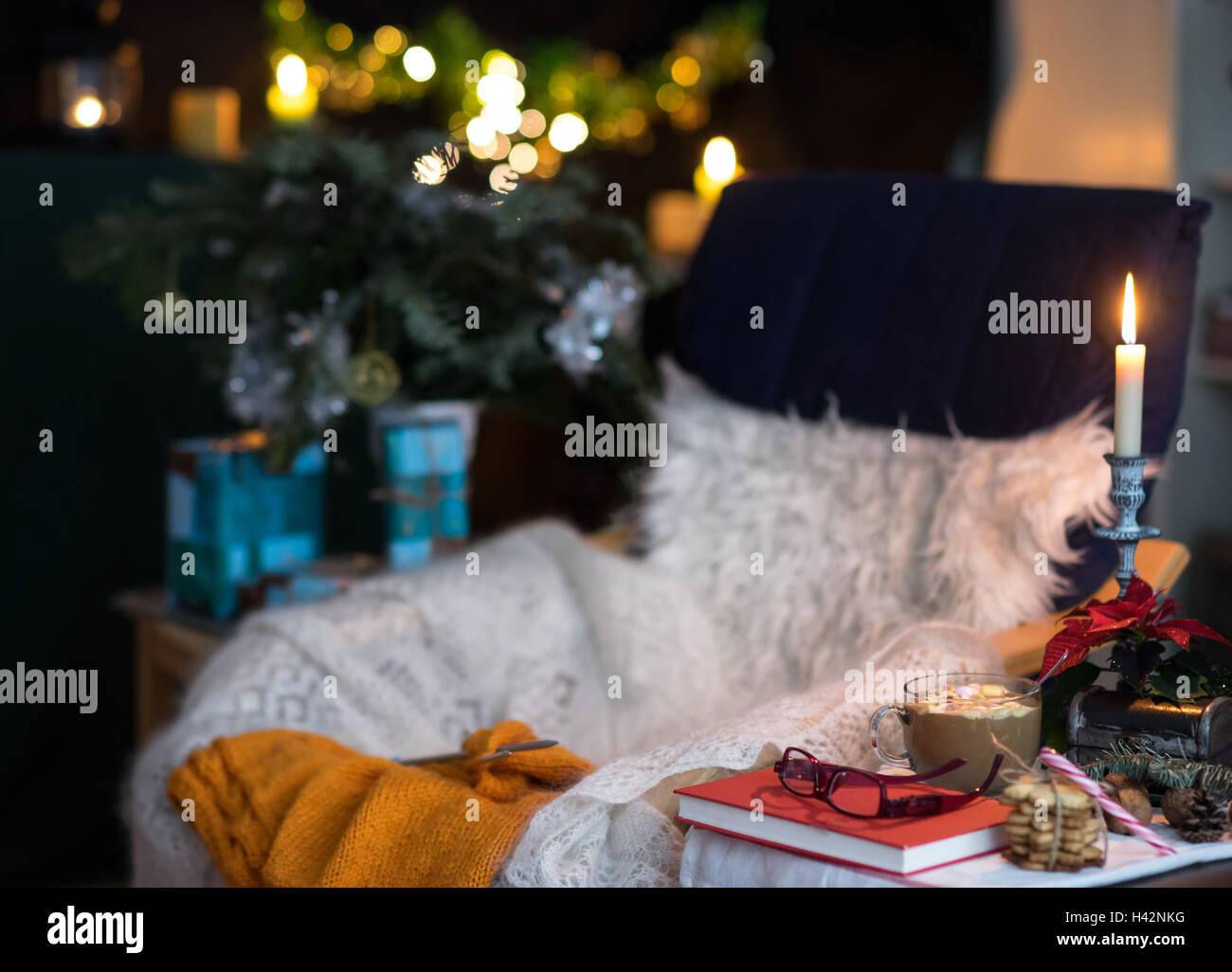 Comfortable place in decorated room for Christmas Stock Photo - Alamy