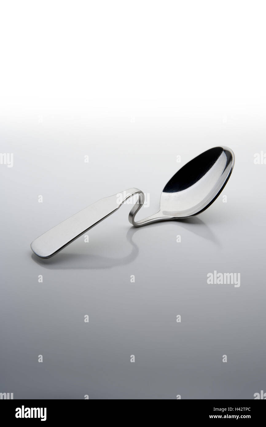 Bent spoon hi-res stock photography and images - Alamy