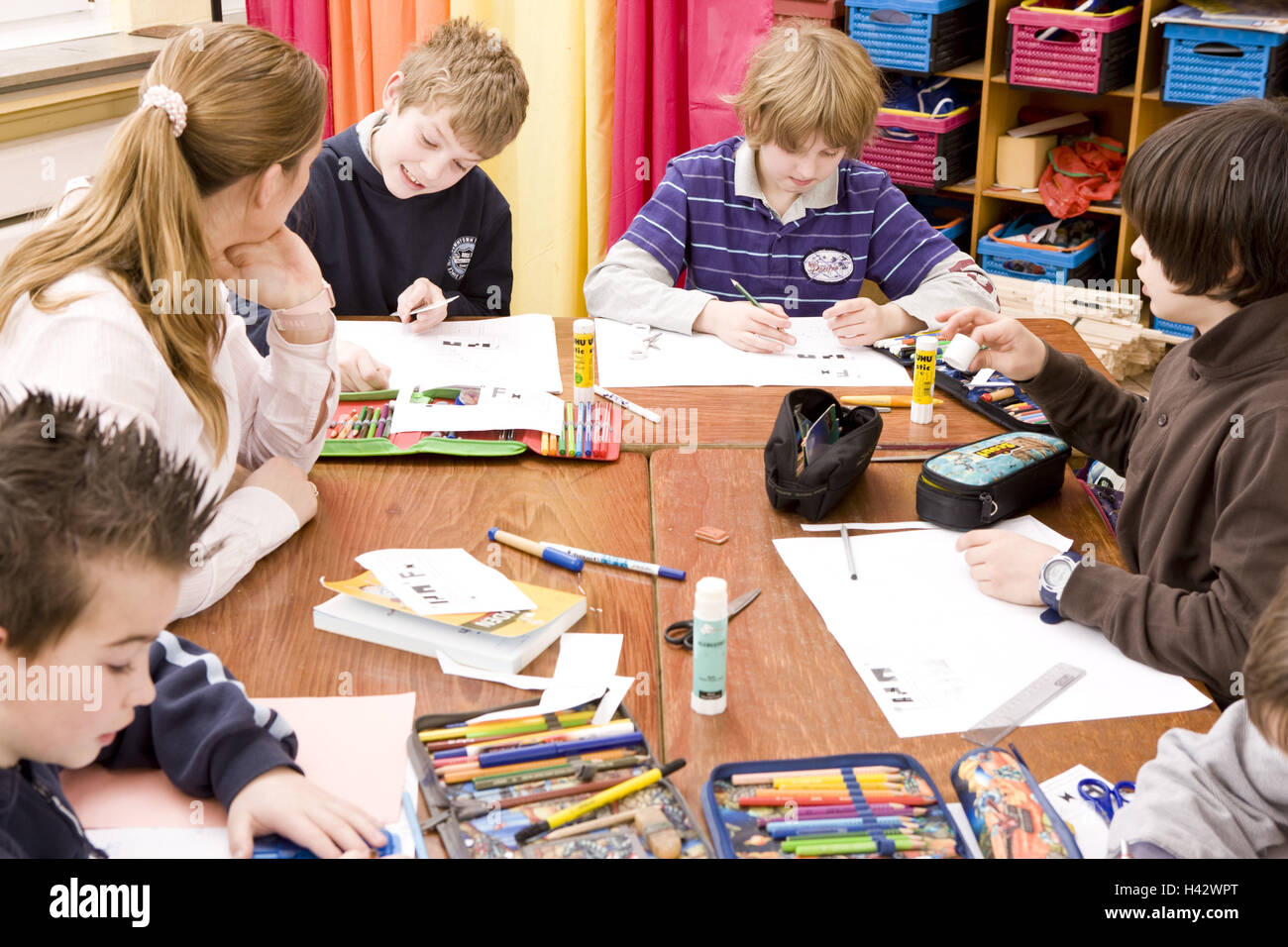 Classroom, schoolboy, teamwork, teacher Stock Photo - Alamy
