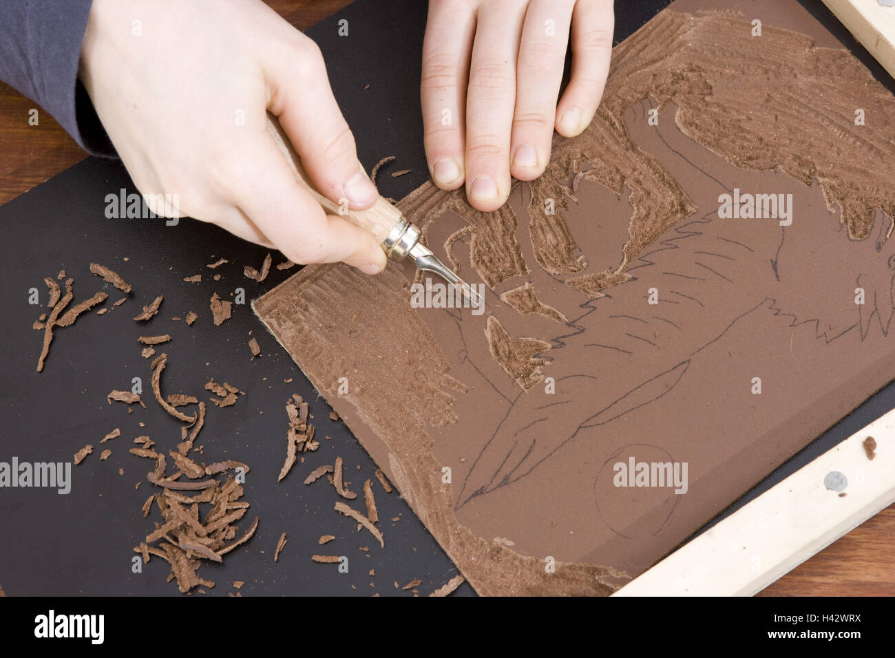 Classroom art lessons boy linocut hi-res stock photography and images ...