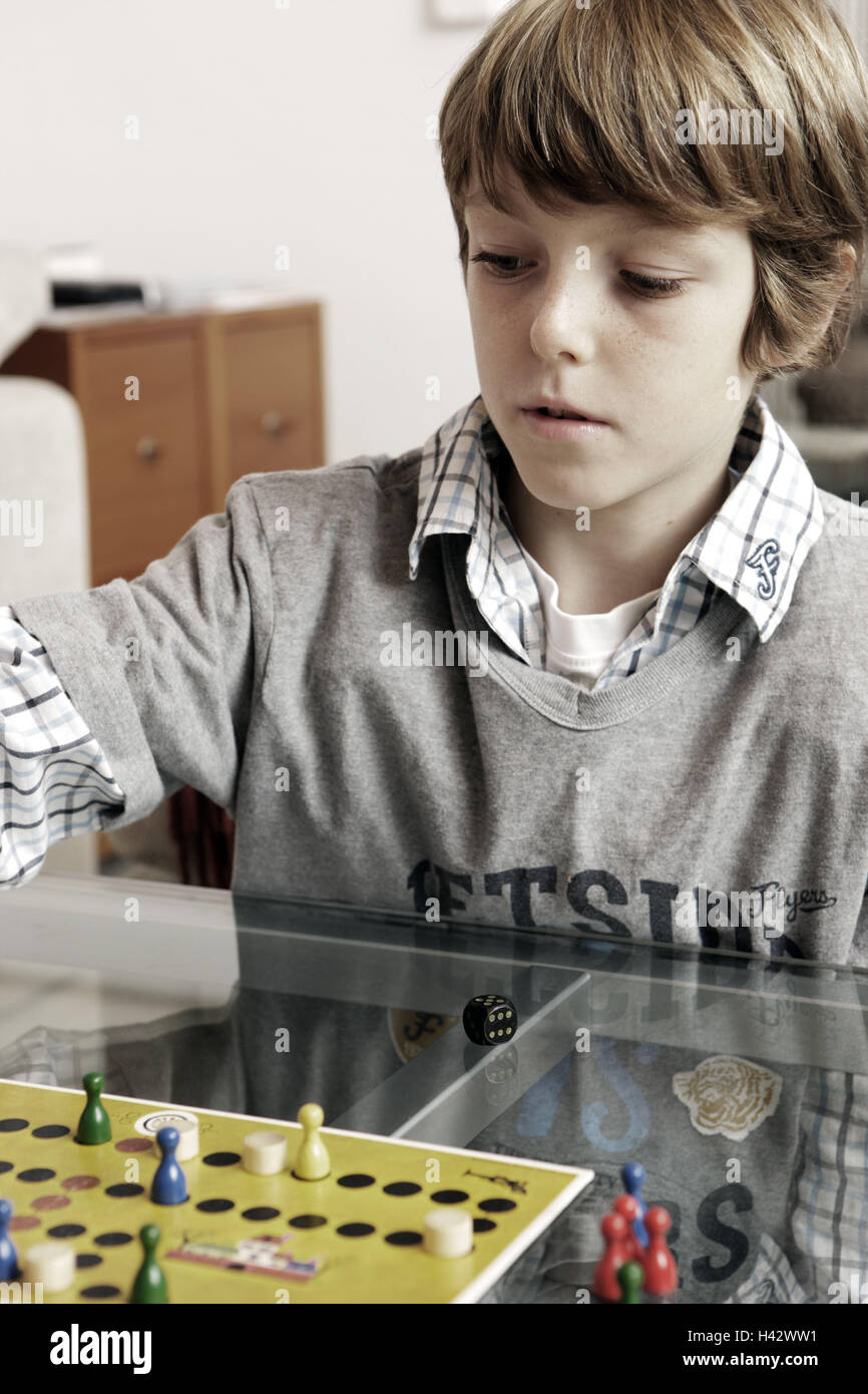 Boy, board game, portrait Stock Photo - Alamy