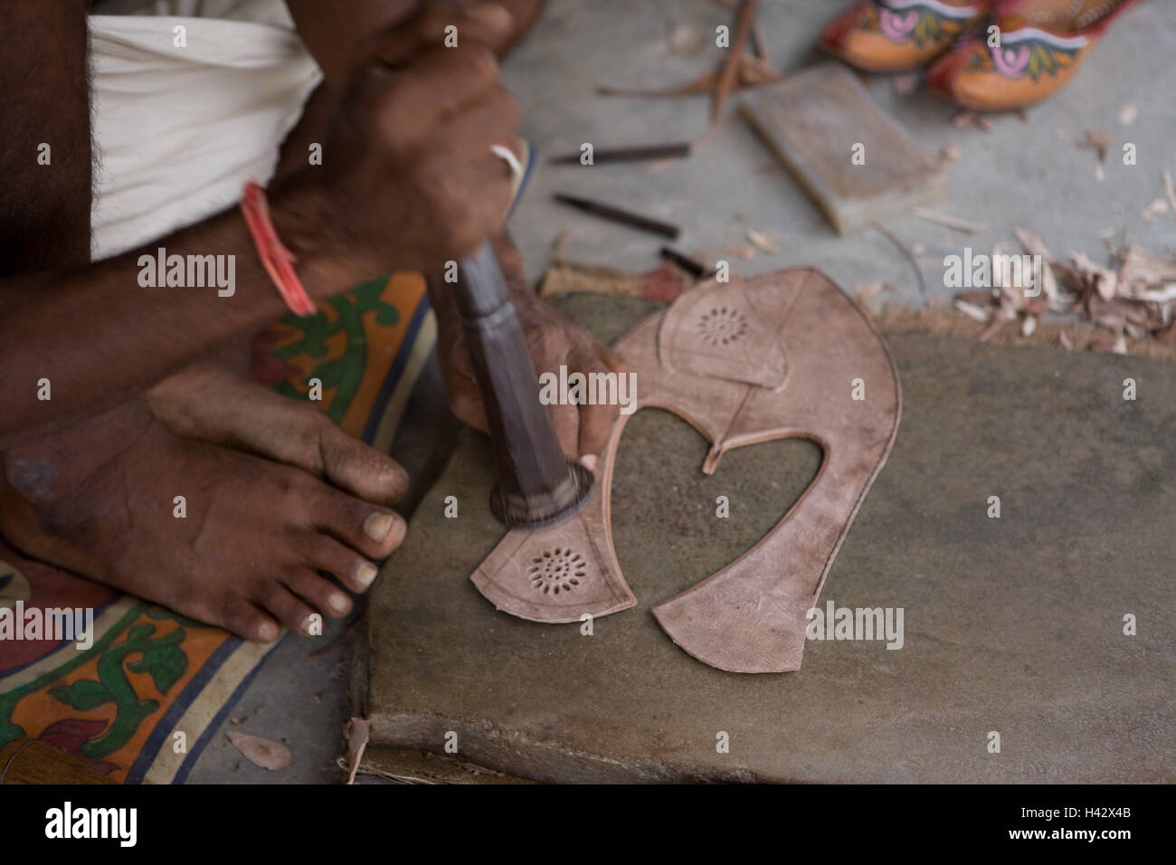 India, Rajasthan, Luni, shoemaker, leather, punch detail Stock Photo ...
