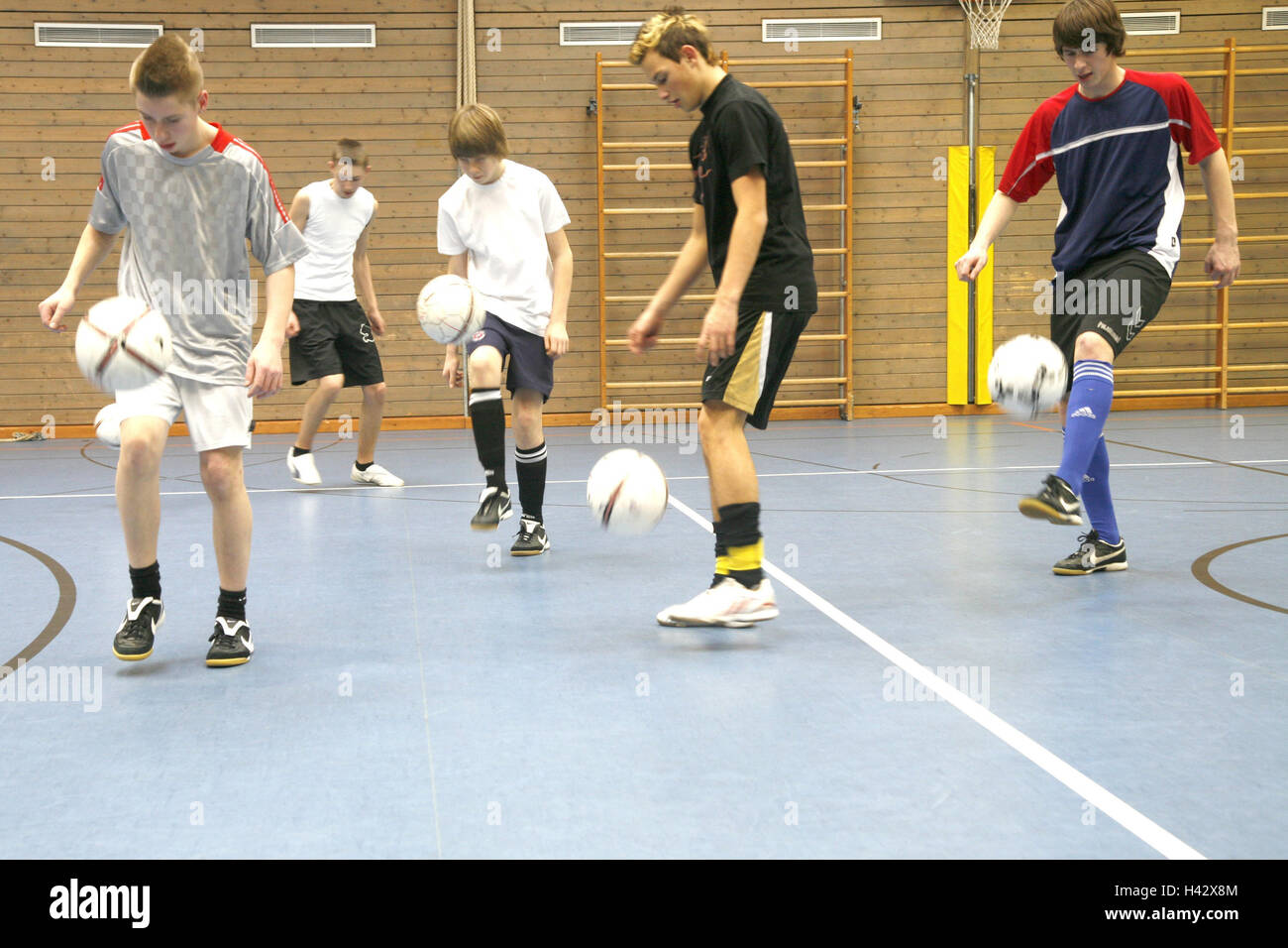 Gymnasium, teenager, boy, football training, model released, school ...