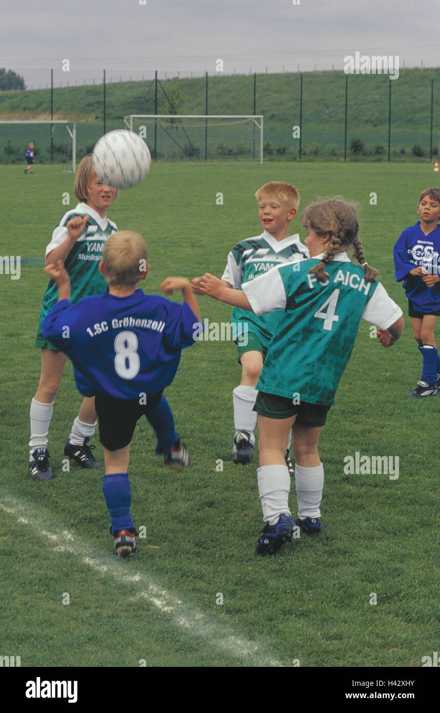 Football pitch, boy, girl, jerseys, training, no model release, only ...