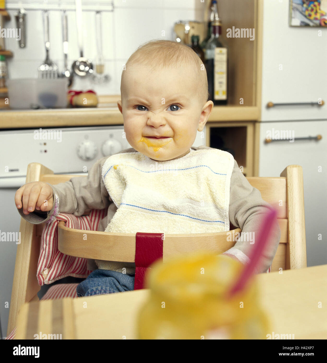 Sits baby, child chair, mash, eats, Mouth, full-lubricated, facial ...