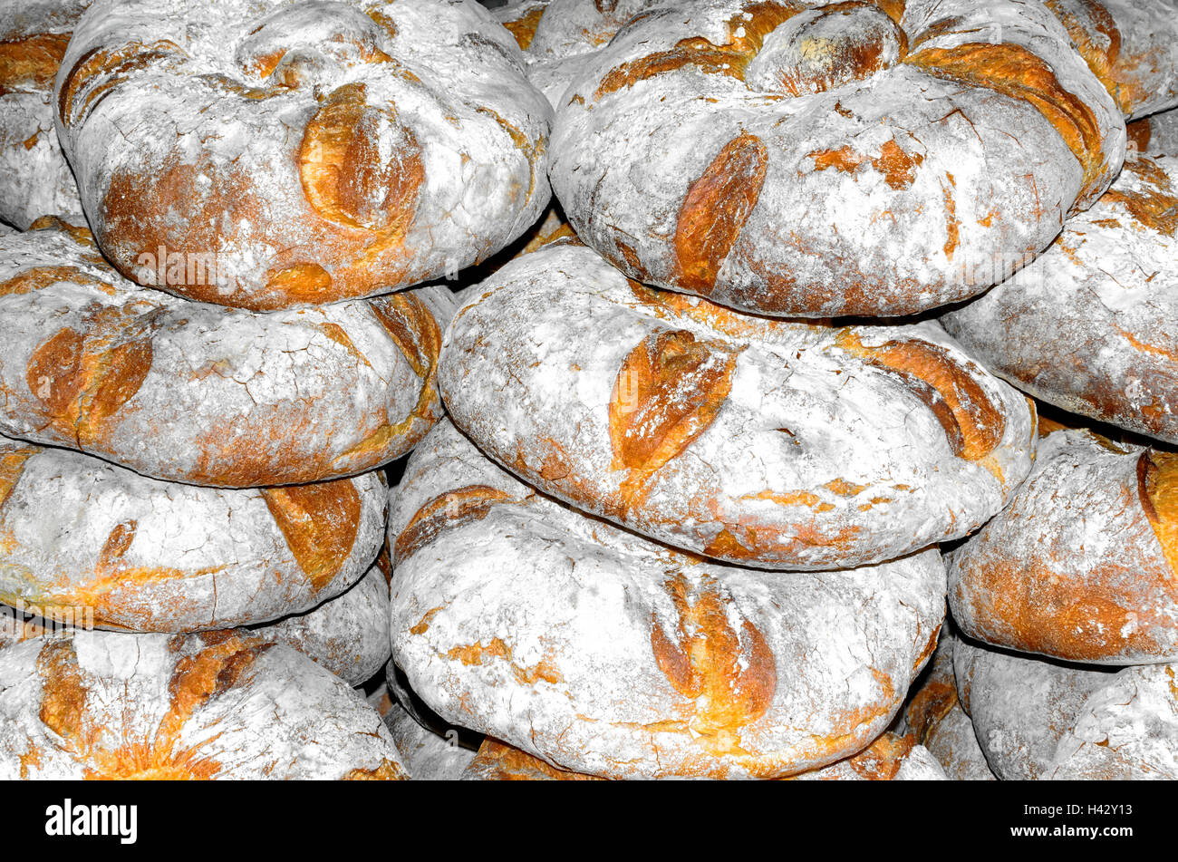 Big round breads for sale at a medieval bakery stall. Village's food ...