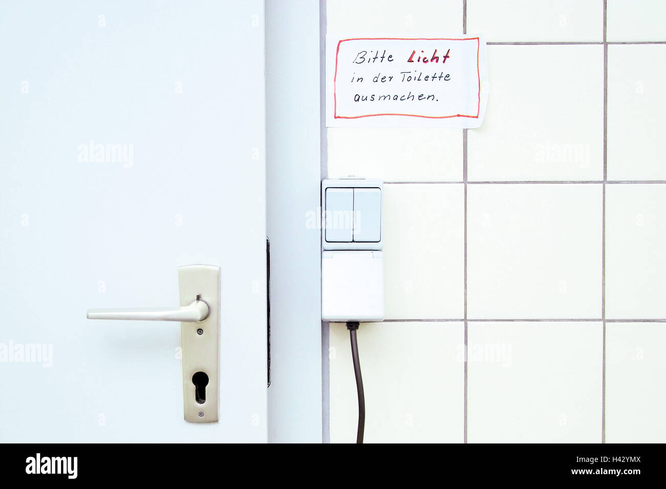 Toilet door, wall, tiles, light switches, sign, socket, WC, WC room ...