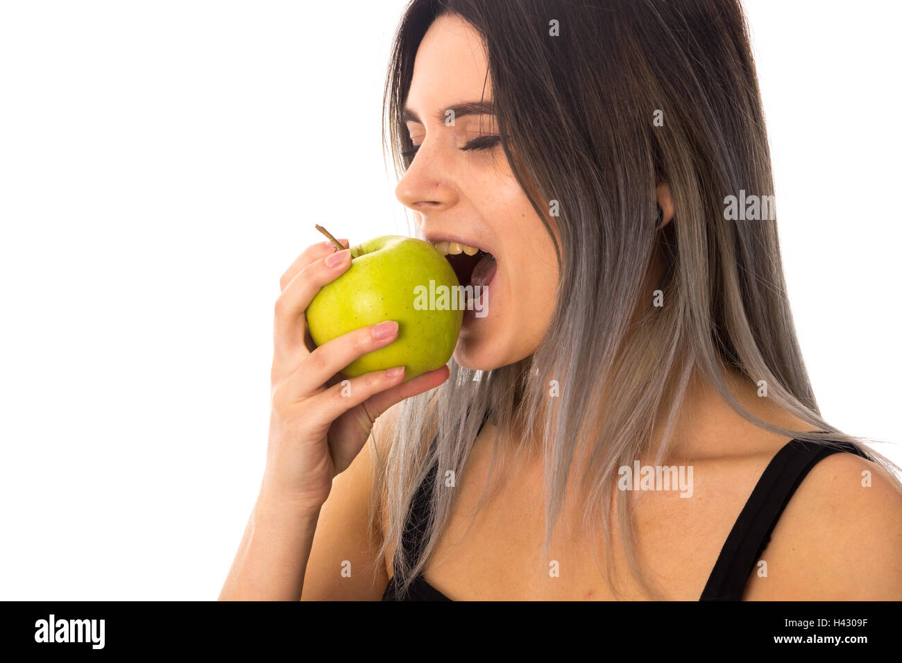 Woman eating an apple hi-res stock photography and images - Alamy