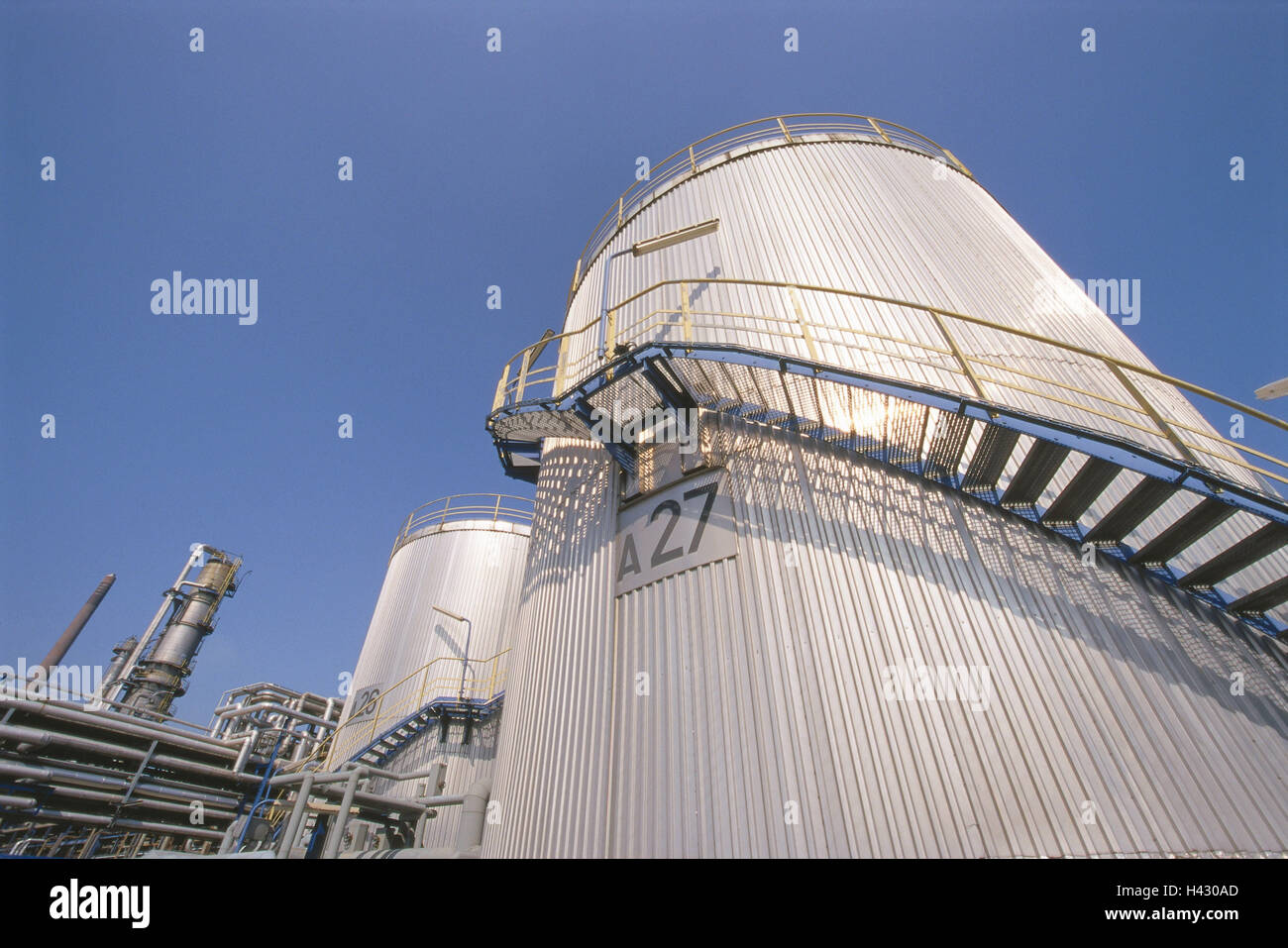 Refinery, warehouse tanks, detail, from below, industrial plant ...