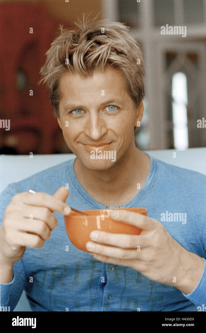 Man, smile young, muesli peel, view camera, portrait, single, blond, 33 ...