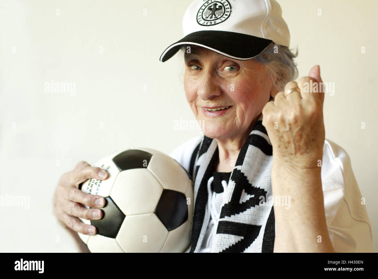 Senior, football fan, happy, gesture, fist, ball, portrait, sport ...