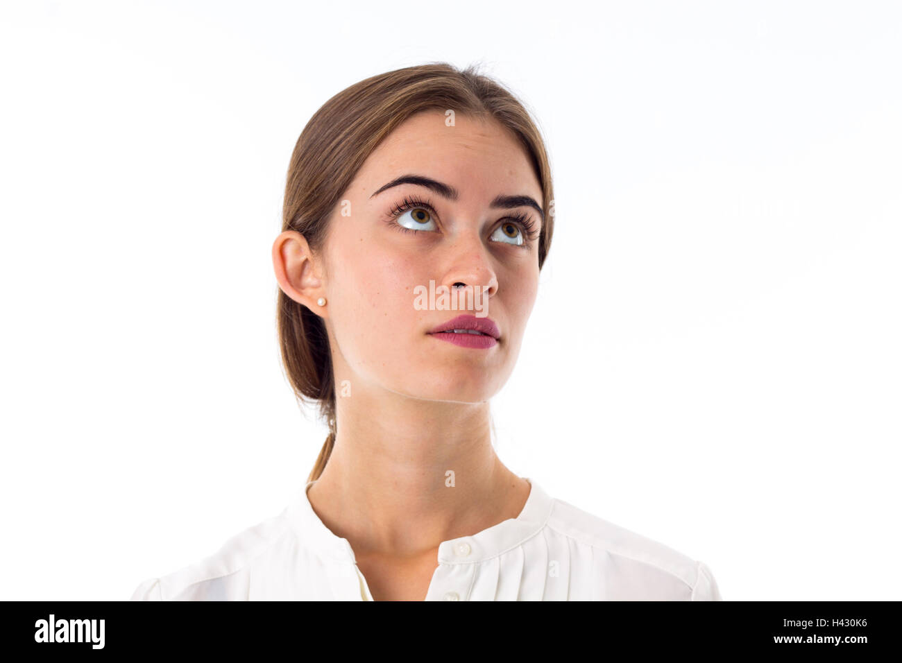 Woman looking up Stock Photo - Alamy