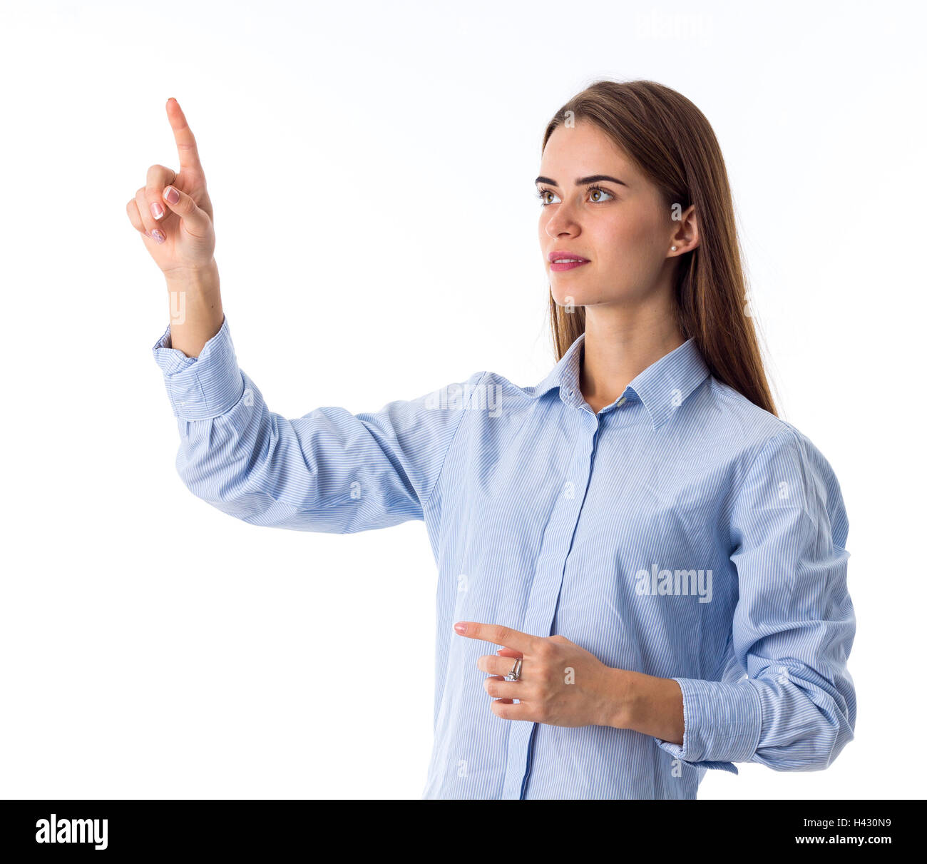 Woman pointing up Stock Photo - Alamy