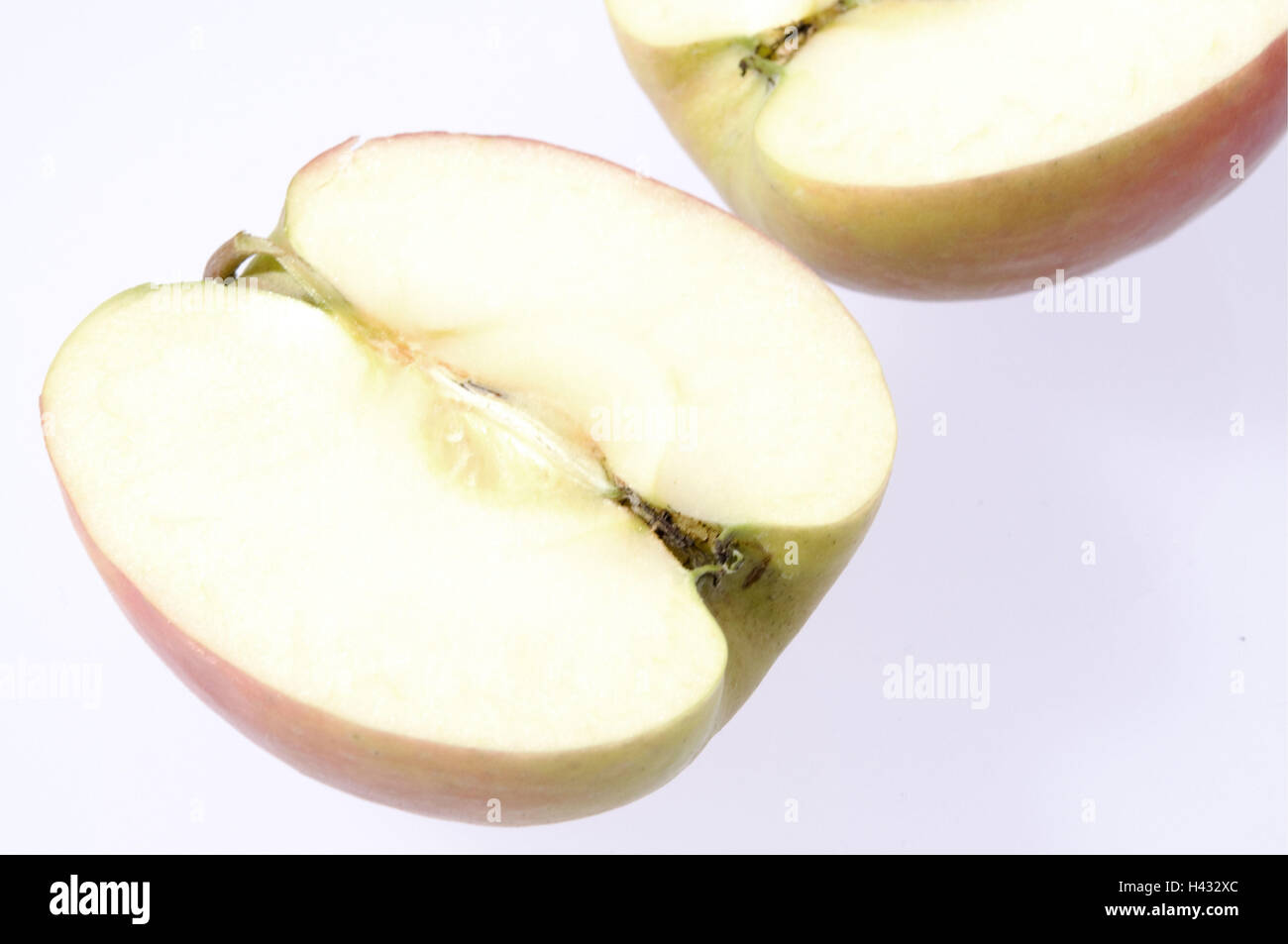 Apple in halves hi-res stock photography and images - Alamy