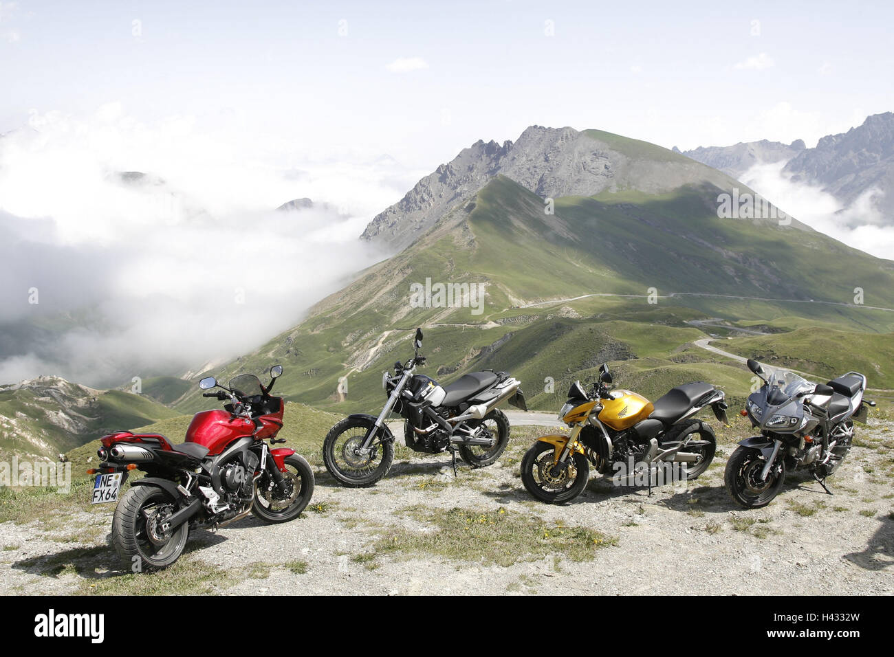 Motorcycles, vertical, alp scenery Stock Photo - Alamy