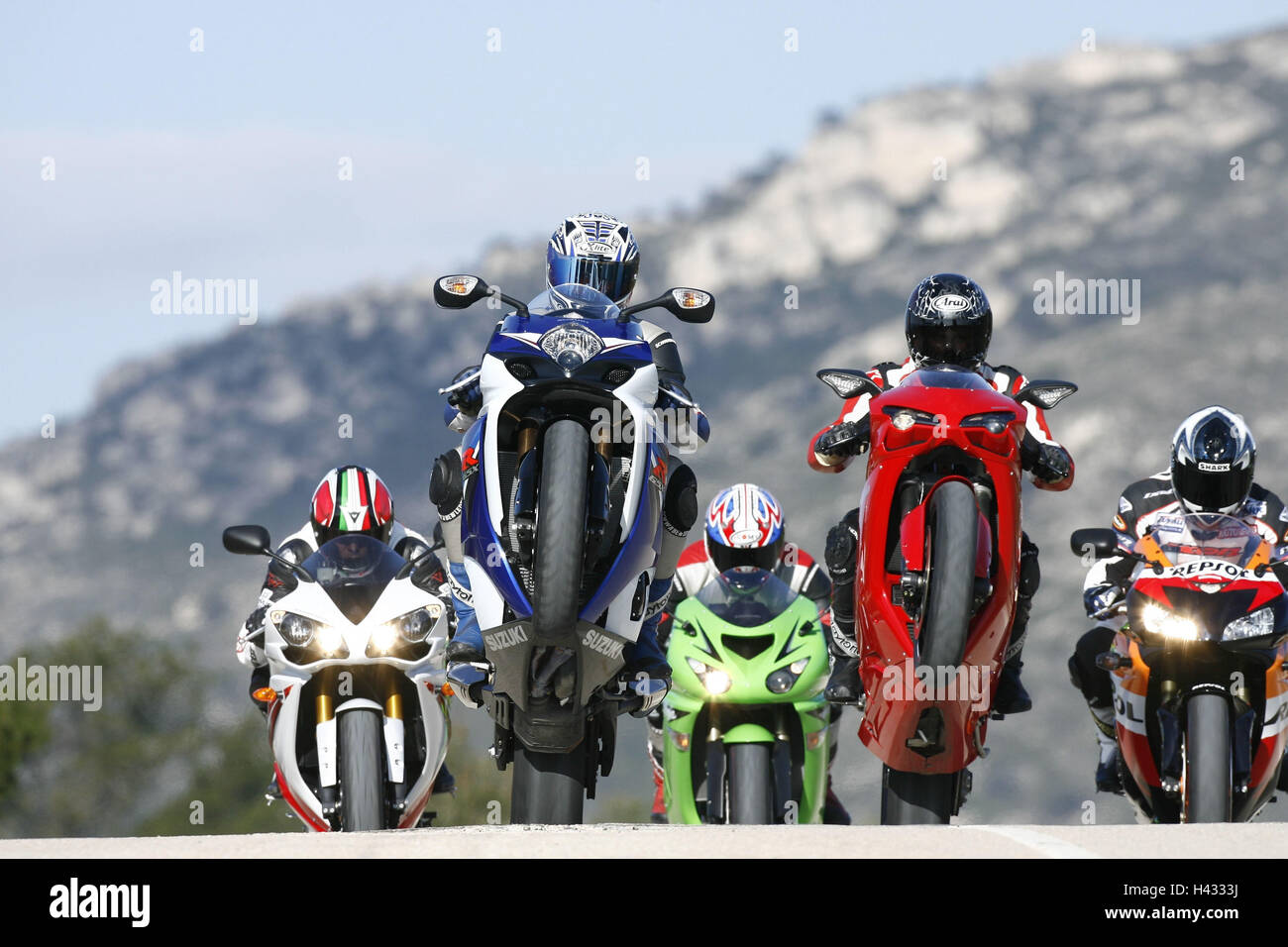 Motorcycles, 1000th comparative test, 5th formation, moving, head-on ...