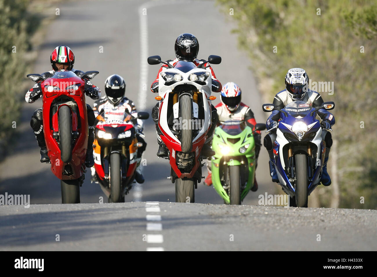Motorcycles, 1000th comparative test, 5th formation, moving, head-on ...