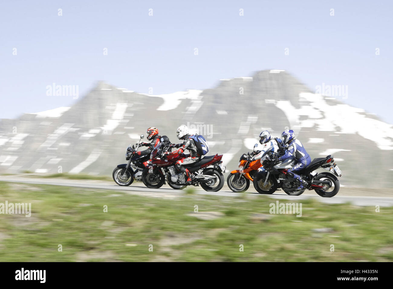 Motorcycles, 4th formation, alp scenery Stock Photo - Alamy