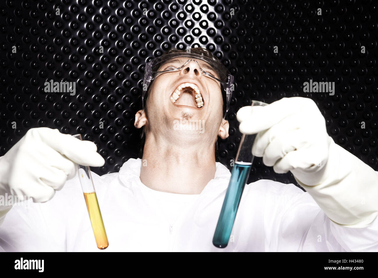 researcher, protection suit, protective goggles, laughing, test tubes ...