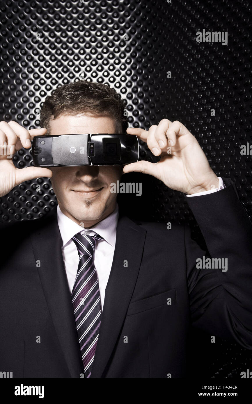 Businessman, mobile phone, look, reproach, portrait, model released, no ...