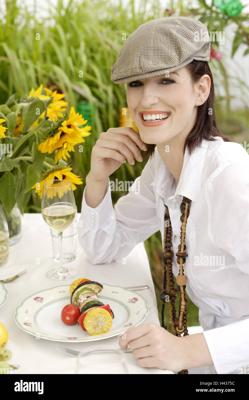 Garden, woman, smile, table, sit Stock Photo - Alamy
