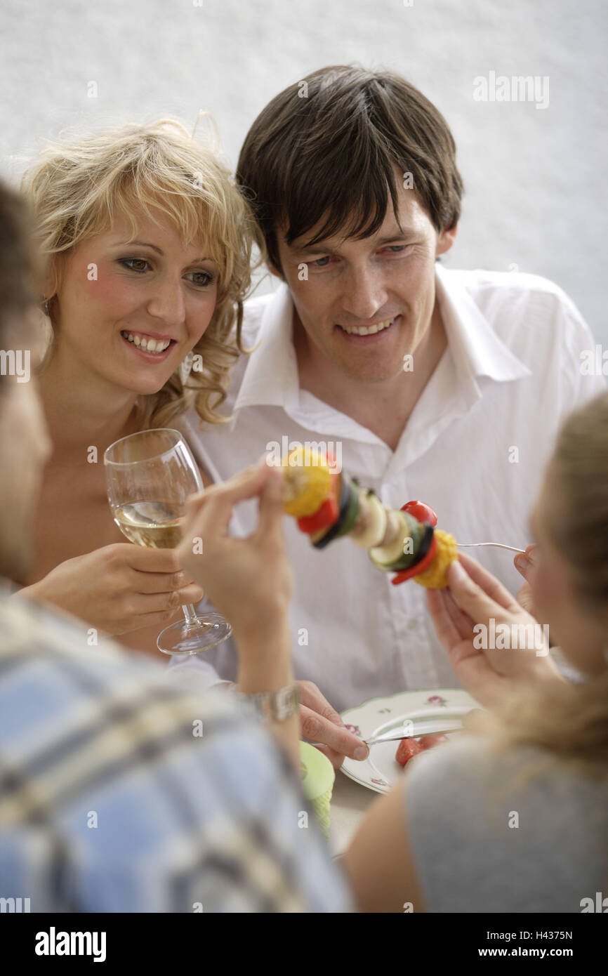 Couples, grill party, vegetable spit, portrait, curled, blur Stock ...