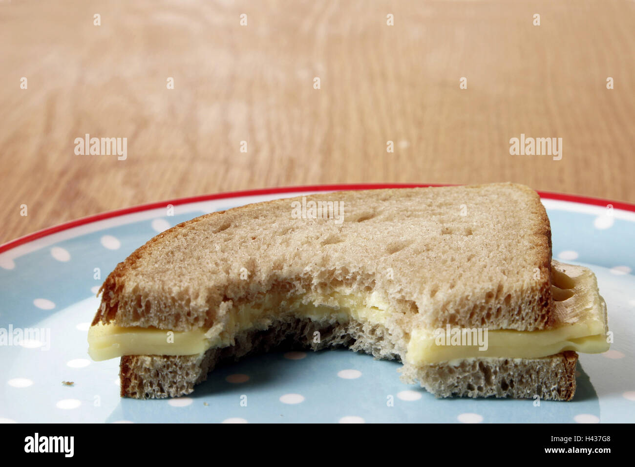 Cheese sandwich, bitten into Stock Photo - Alamy