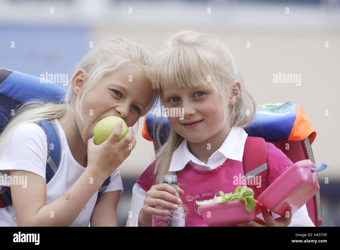 Girls, school children, break, snack, sit, outside, elementary school ...