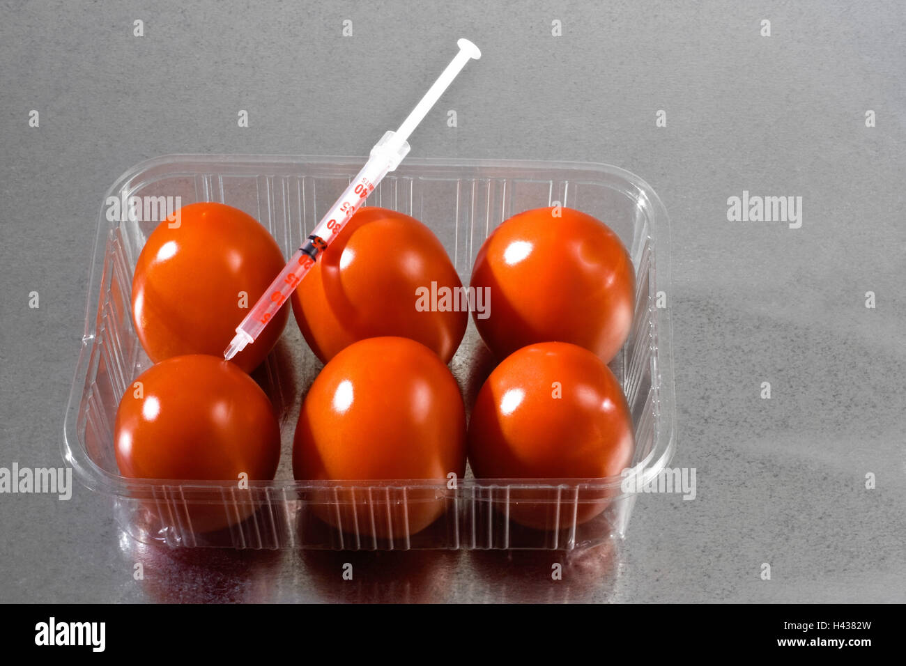Tomatoes syringe injection hi-res stock photography and images - Alamy
