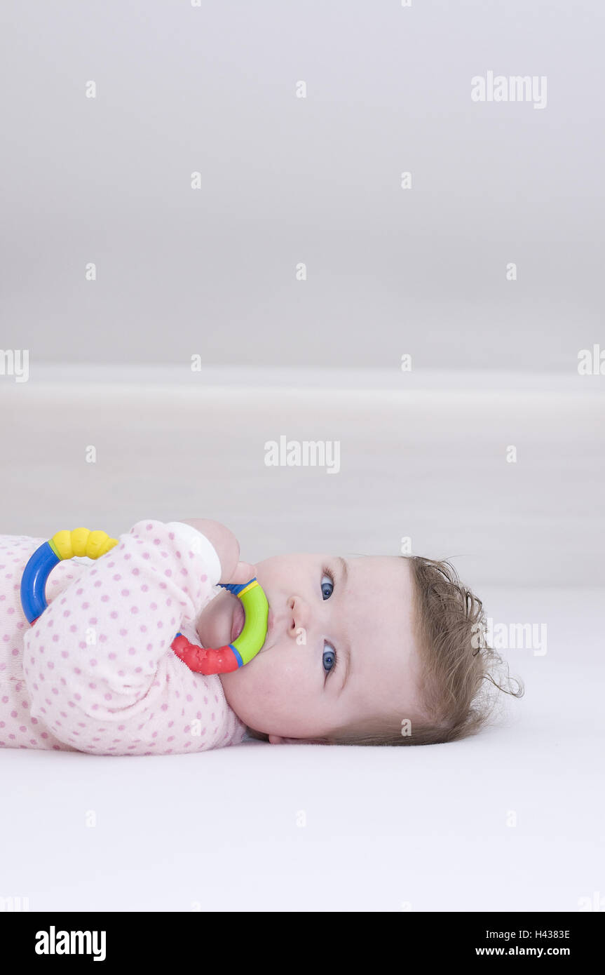 Baby, Beißring, back position, portrait Stock Photo - Alamy