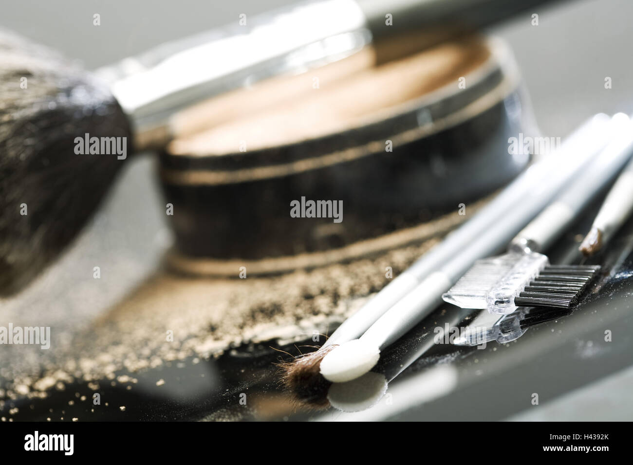 Powdered tin, brush, powder, applicators, detail, blur Stock Photo - Alamy