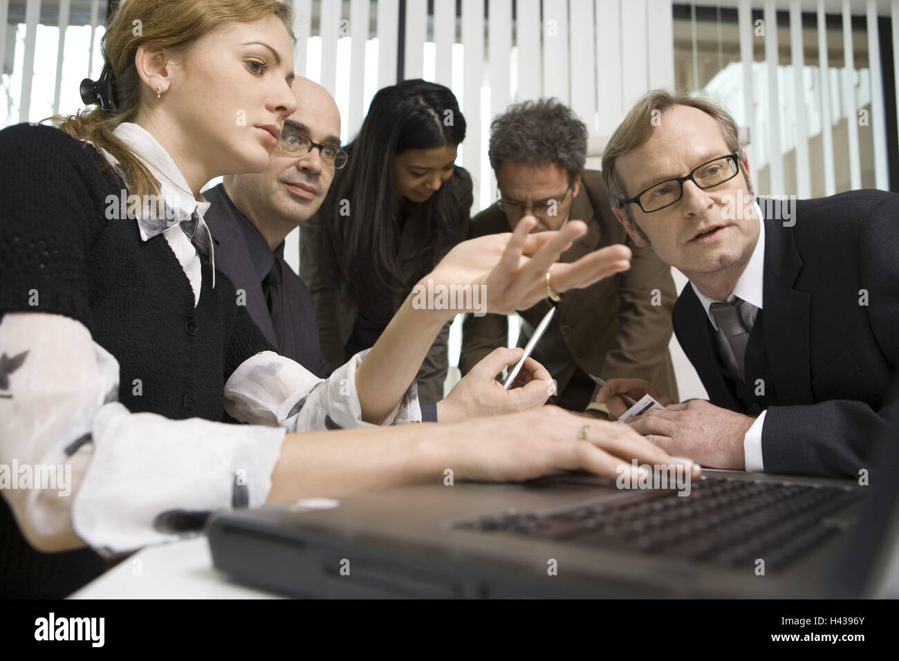 Office, business people, view laptop, conversation, curled Stock Photo ...
