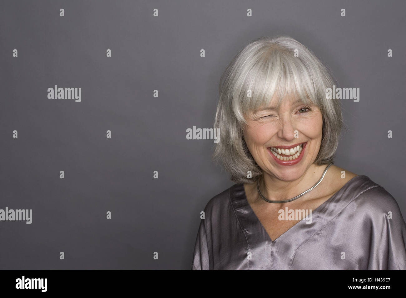 Eye wink hi-res stock photography and images - Alamy