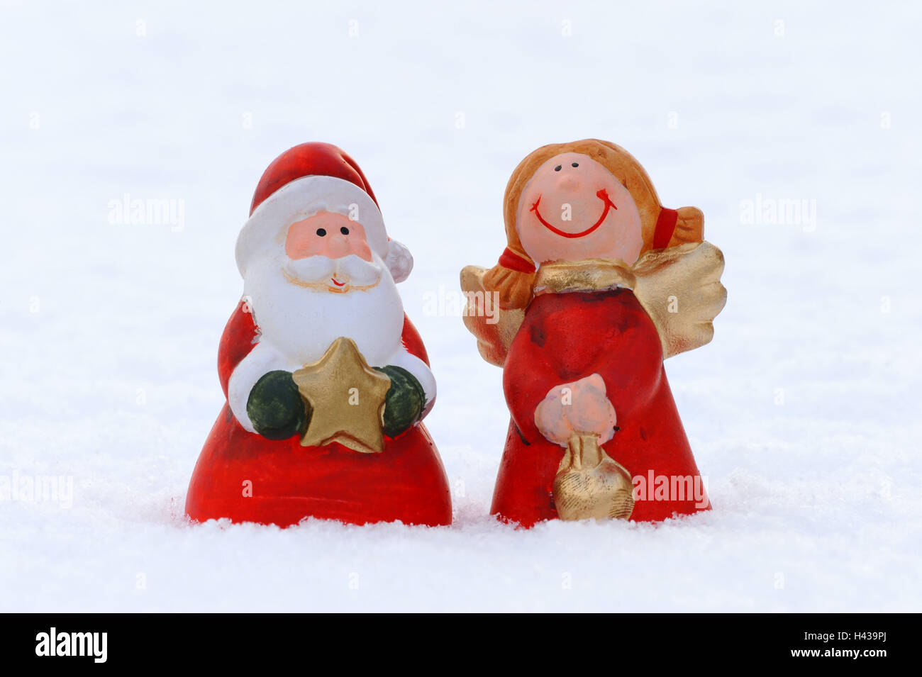 Ceramics figures, Santa Claus, Christmas angel Stock Photo - Alamy