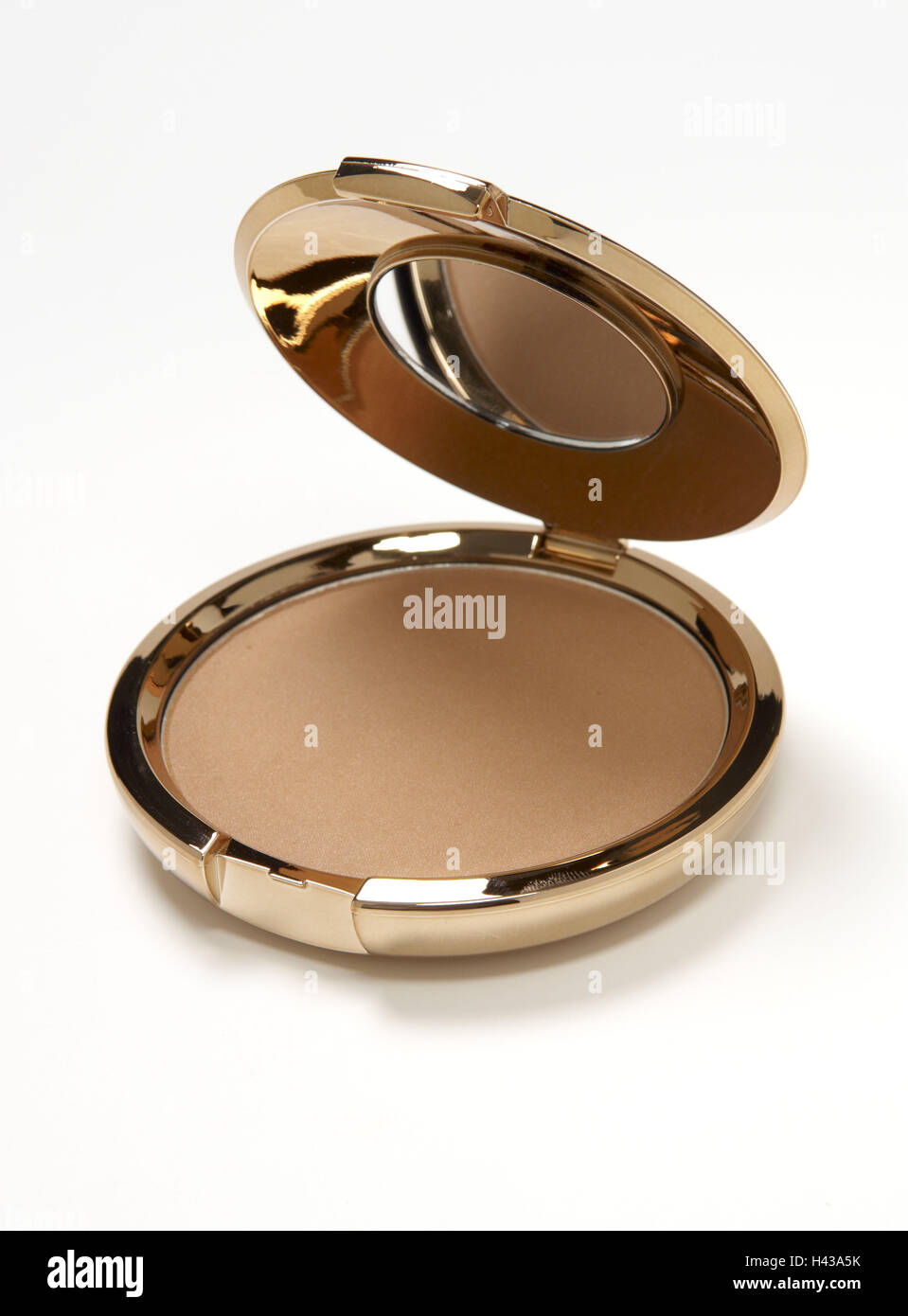 Powder tin, gold Stock Photo - Alamy