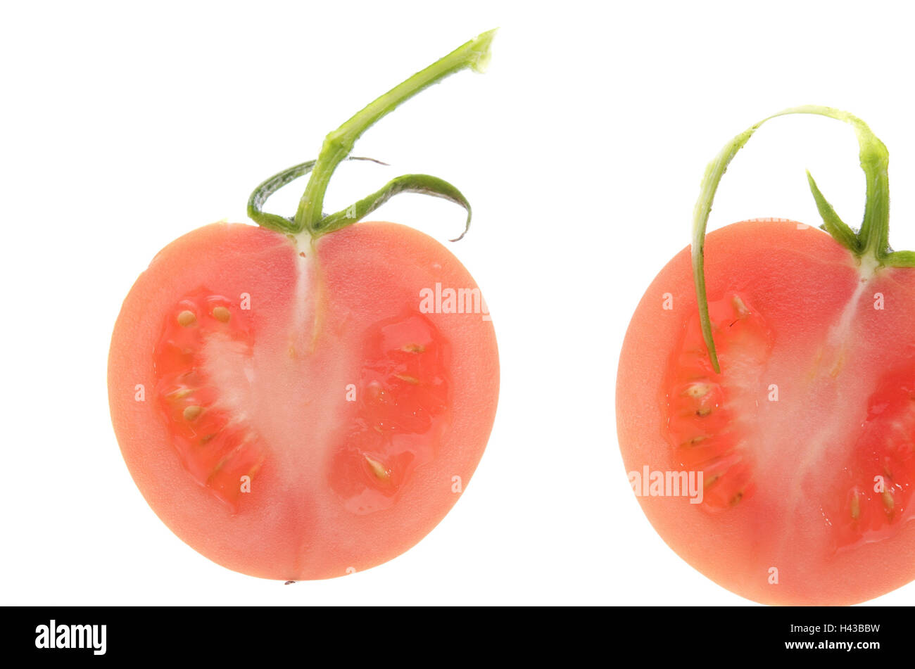 Tomato in halves hi-res stock photography and images - Alamy