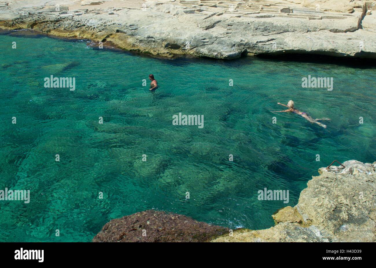 Man and woman swimming in sea, Gozo, Malta Stock Photo - Alamy