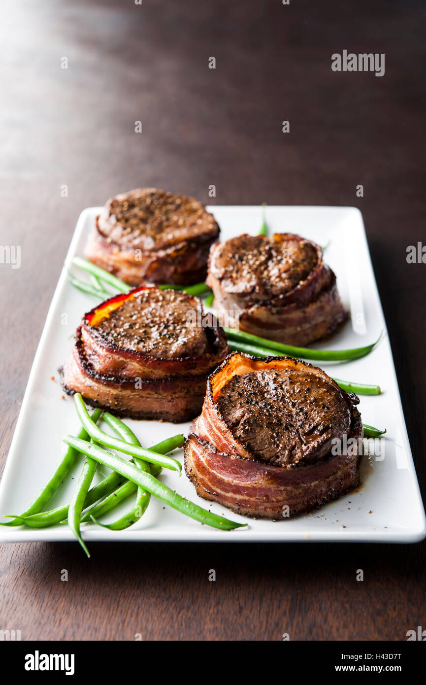 Filet mignon wrapped in bacon Stock Photo - Alamy