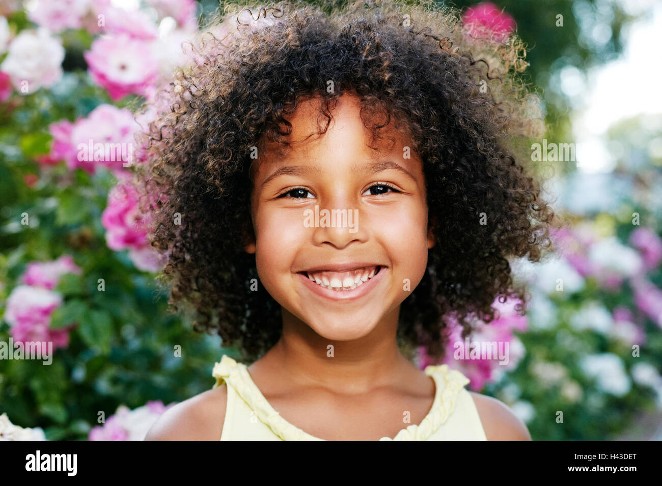 Mixed Race girl smiling outdoors Stock Photo - Alamy