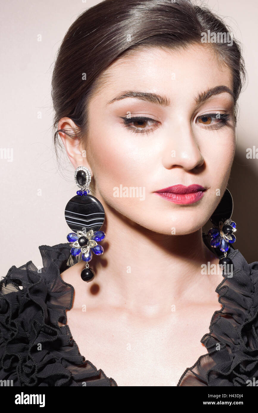 Girl with earrings Stock Photo - Alamy